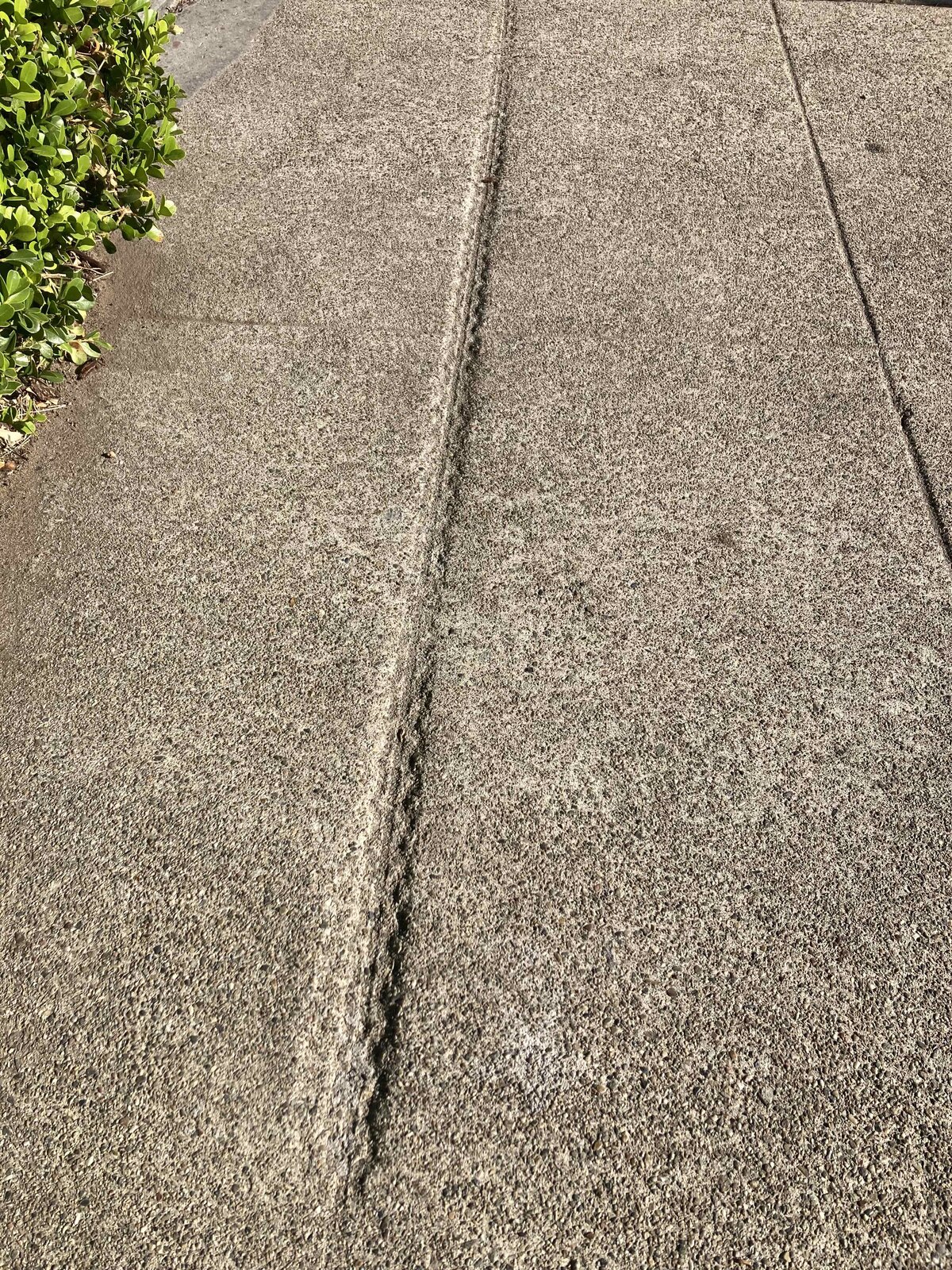 Sidewalk impressions, can anyone identify the bike or tire that left ...